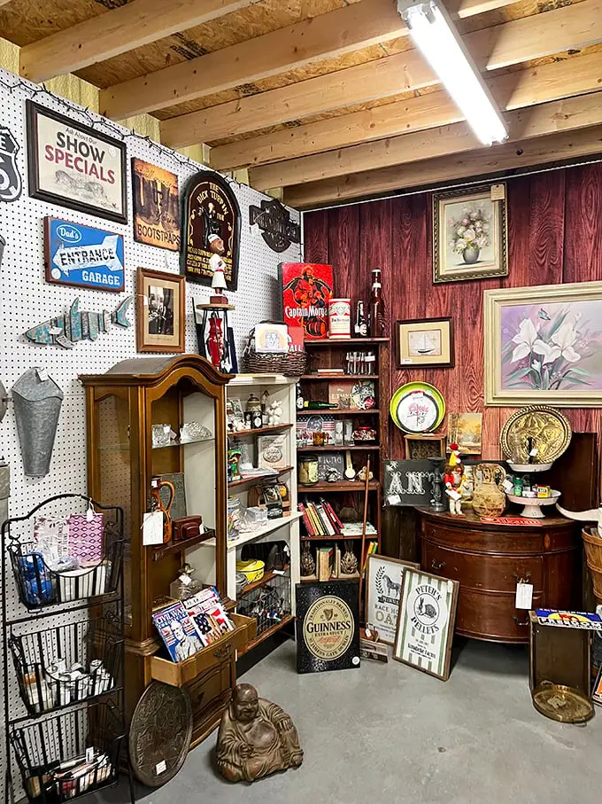 This cozy corner booth feels like walking into your eccentric uncle's den—complete with vintage advertising, weathered wood paneling, and curiosities that demand investigation.
