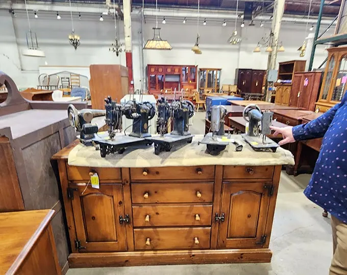 Vintage sewing machines lined up like a museum exhibit of domestic history—each one representing thousands of hems, repairs, and homemade Halloween costumes.