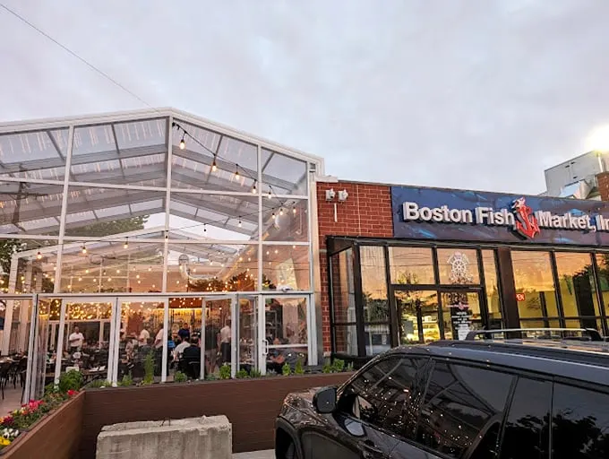 Boston Fish Market's glass-enclosed patio feels like dining in an aquarium – except you're eating the fish, not watching them swim.