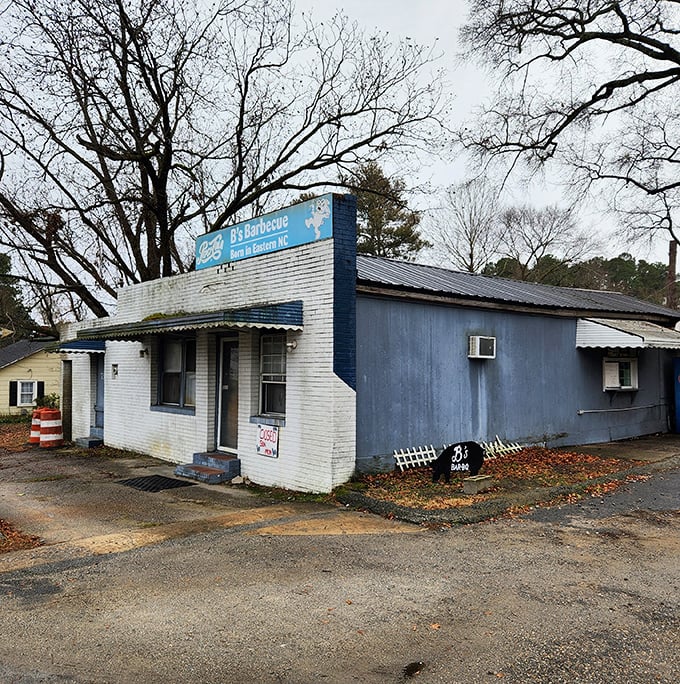 This unassuming spot looks closed until you spot the smoke signals and the line of BBQ pilgrims waiting for divine pork.