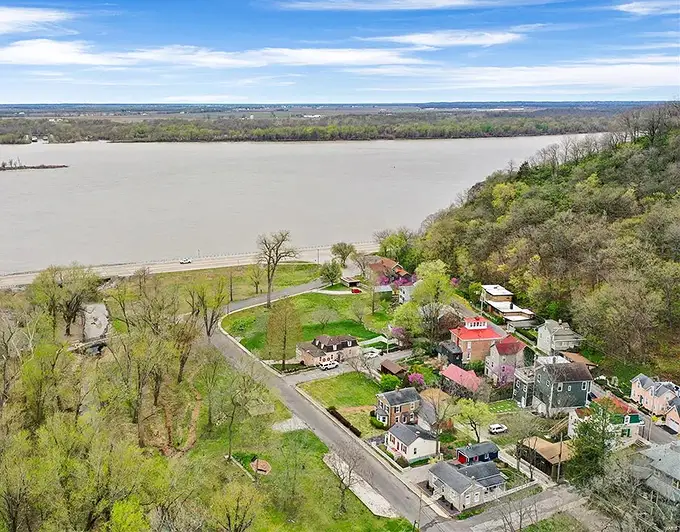 The Mississippi River creates a stunning backdrop for Elsah's historic homes – nature's version of perfect mood lighting.