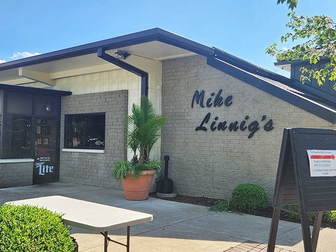 Simple stone exterior, name in elegant script—Mike Linnig's doesn't need to shout about its seafood. The locals do that for them.