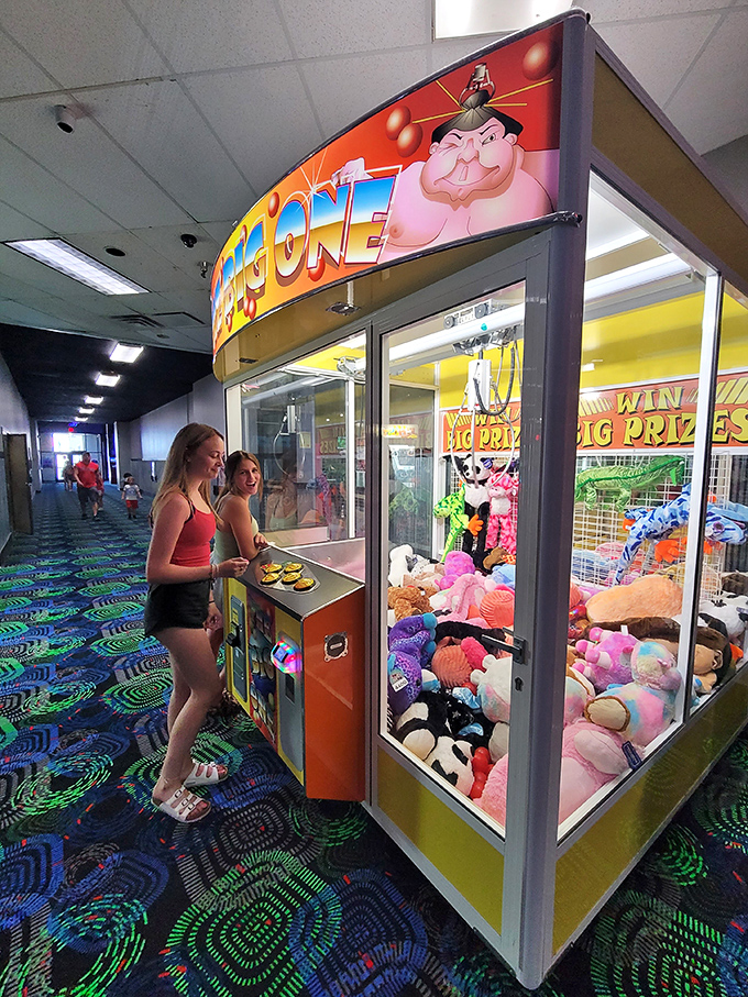 The classic claw machine—where hope springs eternal and stuffed animals play hard-to-get behind that tantalizingly transparent barrier.