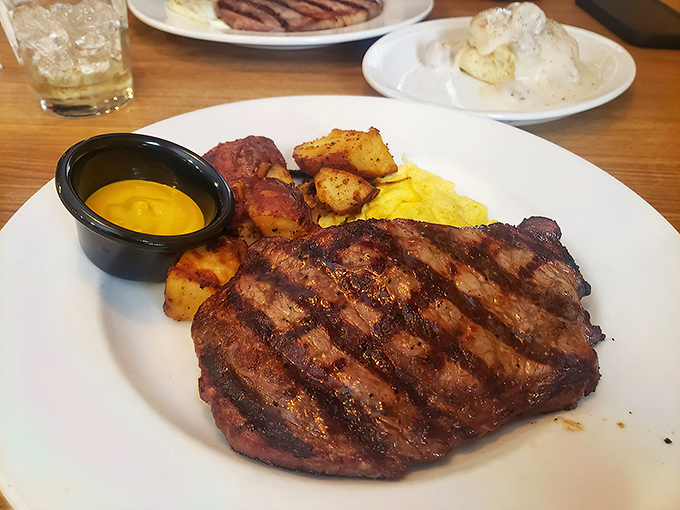 This delmonico steak, potatoes, and cheese sauce trio isn't just dinner—it's edible artwork that would make Michelangelo weep with carnivorous joy.