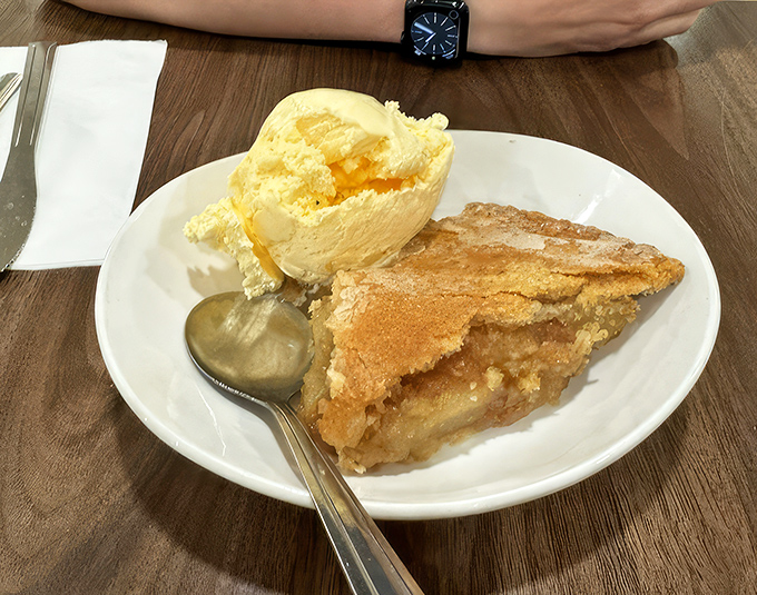 Apple pie that doesn't just speak of America—it sings the national anthem while waving a flag. That scoop of vanilla ice cream? The perfect dance partner.