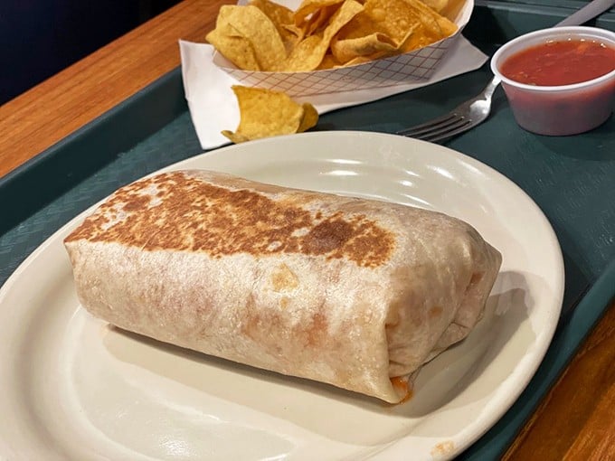 This barbacoa burrito isn't just a meal—it's architecture. Perfectly grilled exterior giving way to a meticulously layered interior that puts most Manhattan apartments to shame.