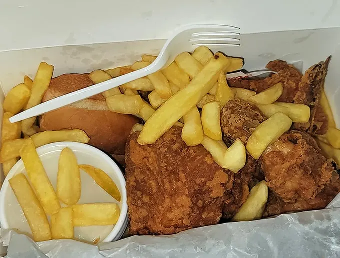 This isn't just chicken and fries; it's an edible love letter to simplicity, where every crispy, juicy bite reminds you that perfection doesn't need fancy packaging.