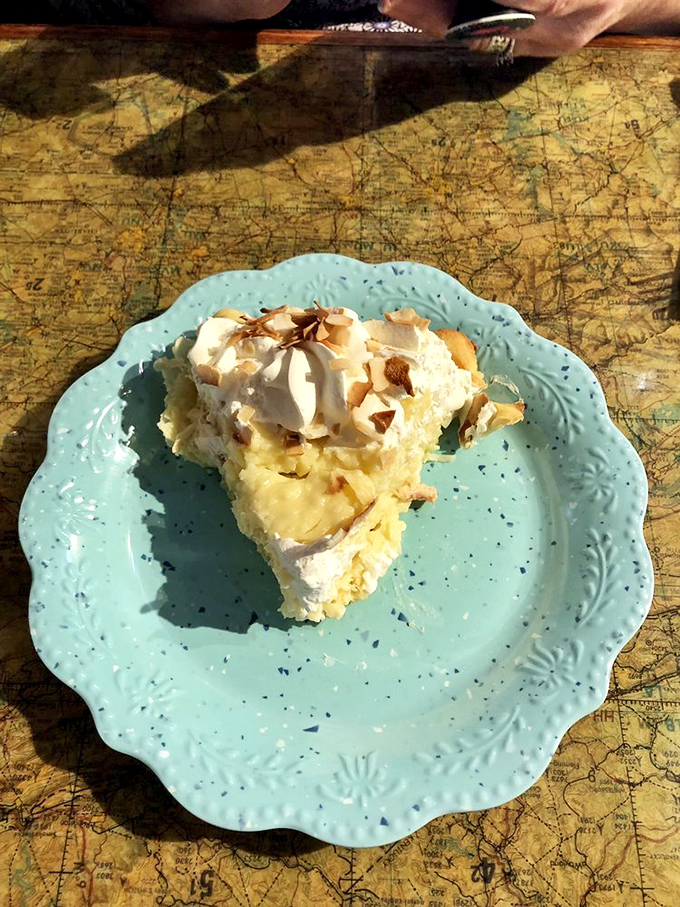 Coconut cream pie served on vintage turquoise dishware—because in New Mexico, even the plates have character and history.