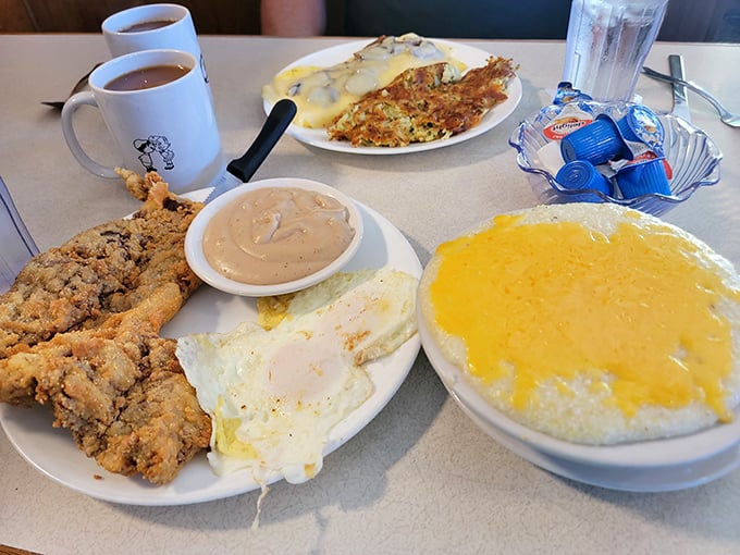 This isn't just country fried steak—it's a Southern benediction. Crispy coating, pepper-flecked gravy, and eggs that know exactly what they're doing.