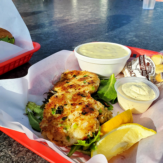 Golden, crispy perfection meets the sea. These crab cakes aren't just food; they're edible postcards from the Pacific. 