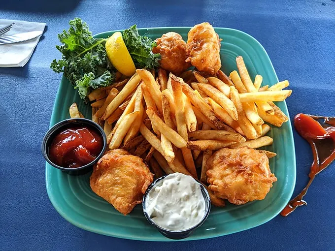 Fish and chips that would make the British jealous—golden, crispy batter surrounding flaky white fish with fries that demand to be devoured.