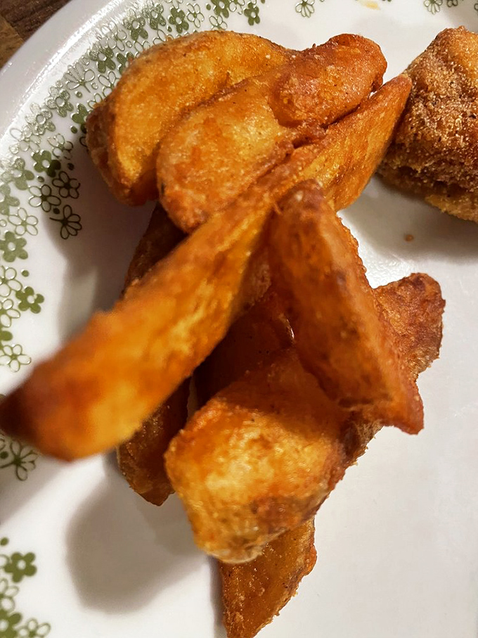 These aren't just french fries; they're supporting actors who deserve their own Oscar for perfectly complementing the seafood star of the show.