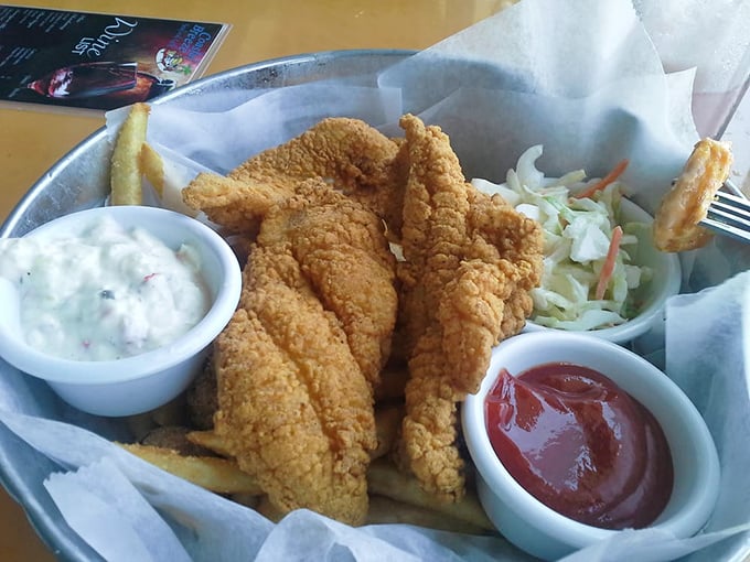 Golden-fried catfish that's crispy on the outside, flaky on the inside—the seafood equivalent of finding the perfect pair of jeans.