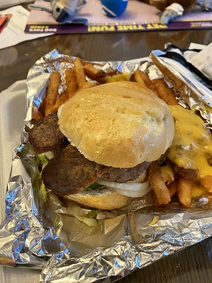 The Gypsy burger arrives like a delicious architectural achievement—proof that sometimes the most beautiful structures are the ones you can eat.