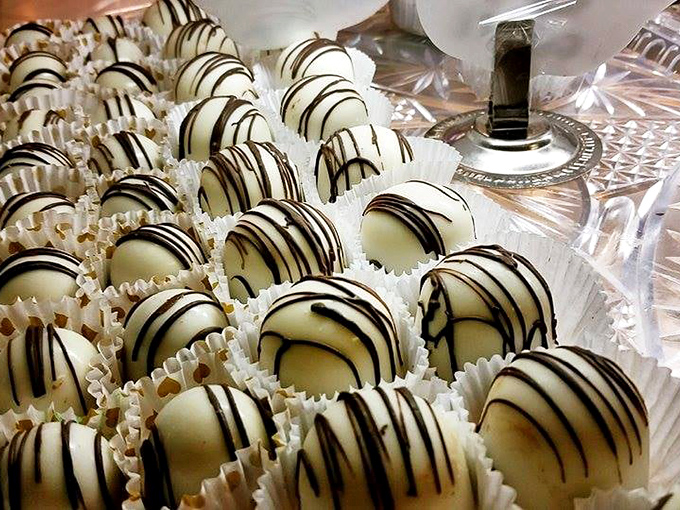 White chocolate truffles with dark drizzles that look like they're dressed for a fancy ball. These elegant morsels are the James Bond of the chocolate world.