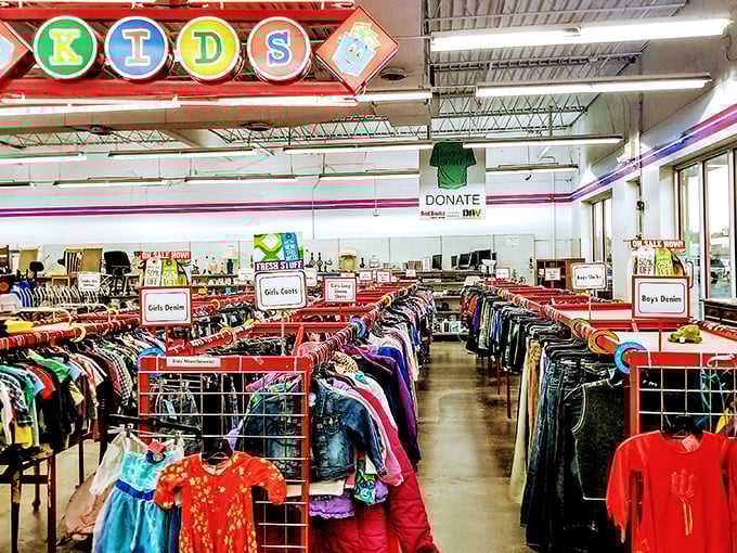 The kids' section beckons with neatly organized racks, where outgrowing clothes isn't a budget crisis but an adventure in affordable style.