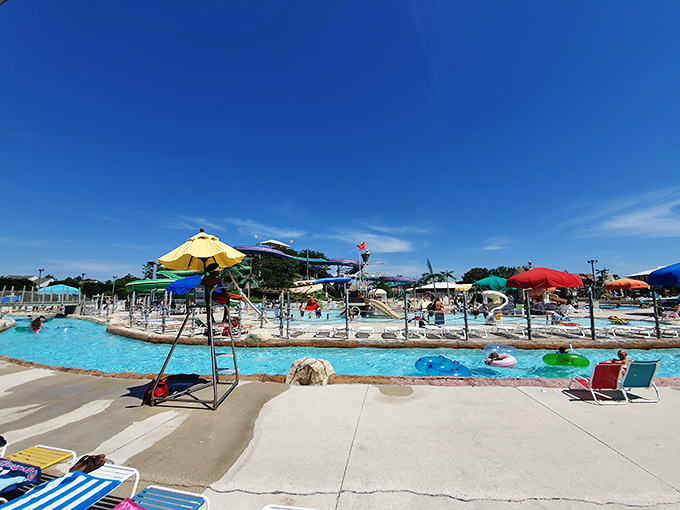 Summer serenity at its finest – the expansive pool area offers plenty of space for swimmers and sunbathers alike under Delaware's blue skies.