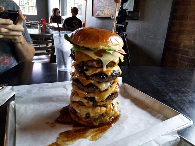 The legendary OMFG burger isn't just a meal—it's a dare, a monument, and possibly your last will and testament all stacked between two buns.