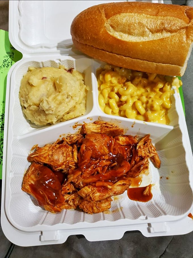 The pulled pork platter comes with all the fixings – mac and cheese, baked beans, and cornbread that would make a Southerner nod in approval.