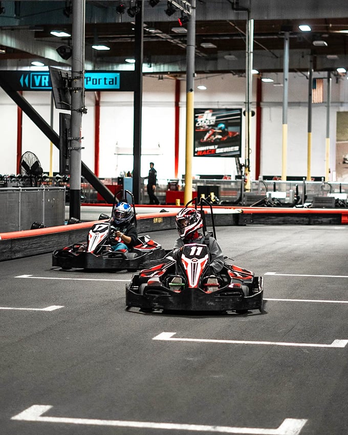 Two racers navigate the course with laser focus. That moment when your office colleague suddenly transforms into Mario Andretti.