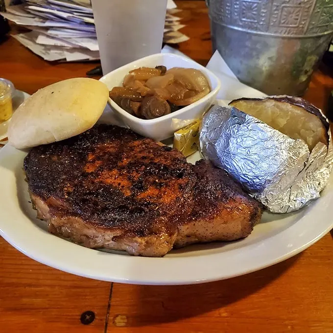 This is not just a steak, it's a declaration of love—with a perfectly seared crust, a baked potato, and mushrooms that have found their true purpose.