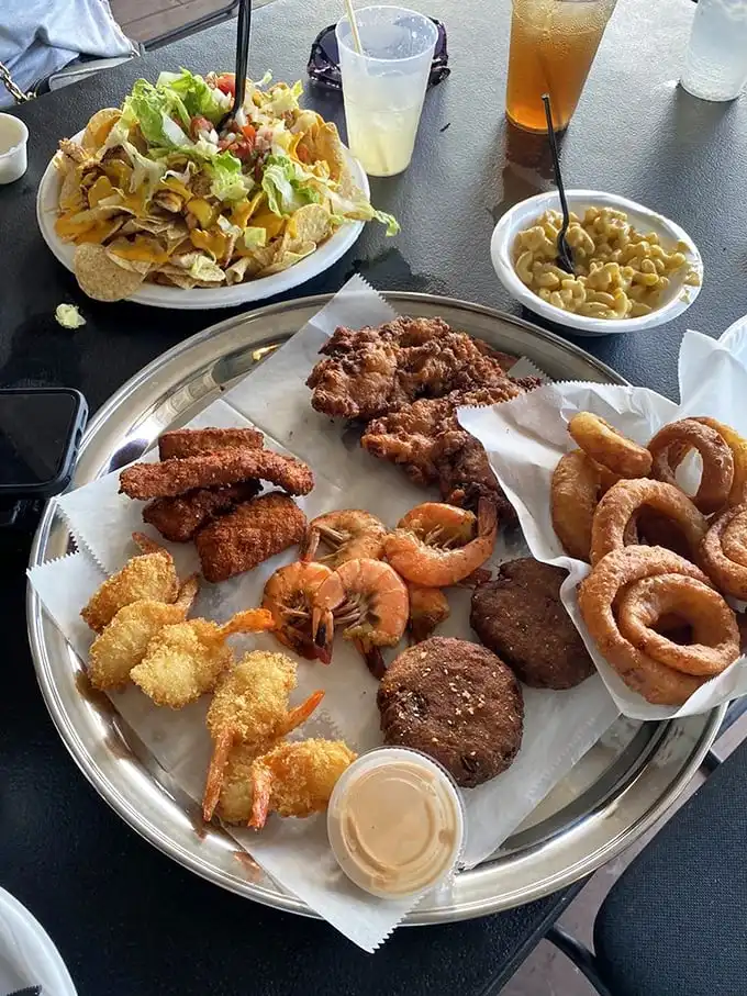 The seafood sampler that answers the eternal question: "Why choose one fried delicacy when you can have them all?"