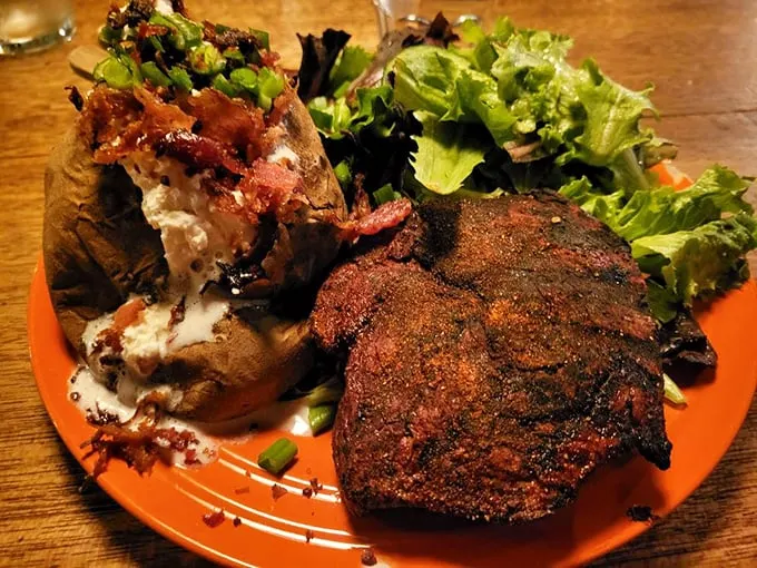 That sear on the sirloin tells you everything you need to know: someone in this kitchen understands the sacred relationship between beef and fire.