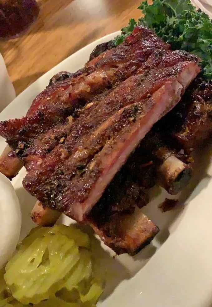 St. Louis ribs with that perfect smoke ring—architectural marvels of meat that would make Frank Lloyd Wright proud.