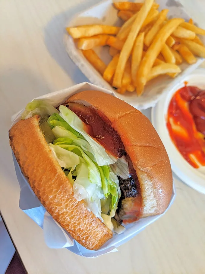 This isn't just lunch; it's edible nostalgia. The Steakburger with its special sauce, crispy fries, and that little cup of ketchup—perfection in paper.