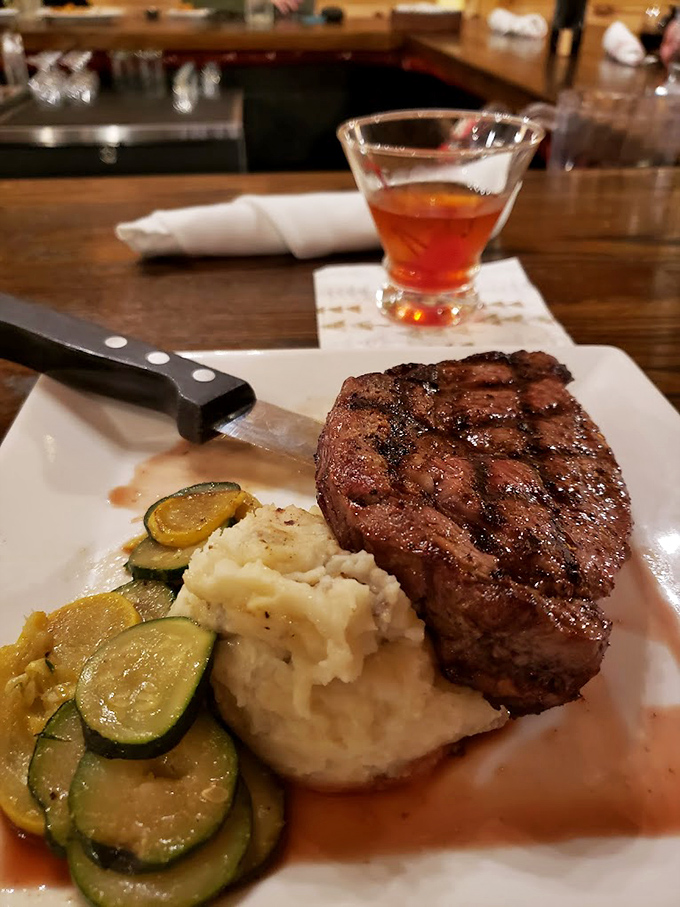 This isn't just dinner—it's a masterclass in meat preparation. The perfect sear, the rosy interior, the mashed potatoes standing by.