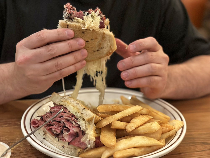 The cheese pull that launched a thousand diets—and broke them all. This sandwich doesn't just satisfy hunger; it creates a core memory of what bread and meat can achieve together.