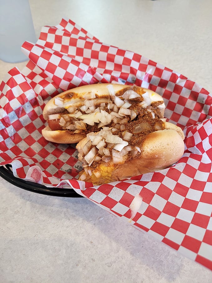 The dynamic duo that's worth every napkin. These chili dogs with their perfectly diced onions are what food dreams—and the occasional shirt stain—are made of.