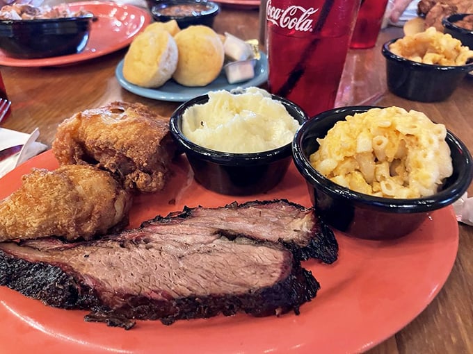 The two-meat platter isn't just a meal—it's a commitment to excellence with sides that refuse to be mere afterthoughts.