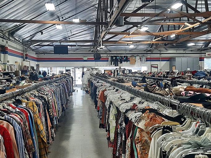 Clothing organized with military precision makes the treasure hunt manageable. The red, white, and blue trim adds a touch of retail patriotism.