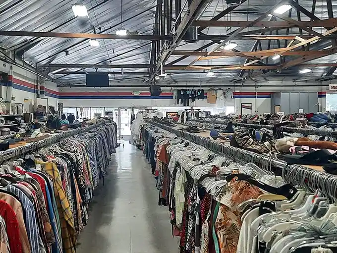 Clothing organized with military precision makes the treasure hunt manageable. The red, white, and blue trim adds a touch of retail patriotism.