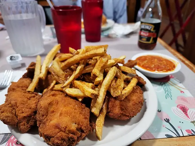 The kind of plate that makes dietitians weep and food lovers rejoice. Those hand-cut fries deserve their own fan club.