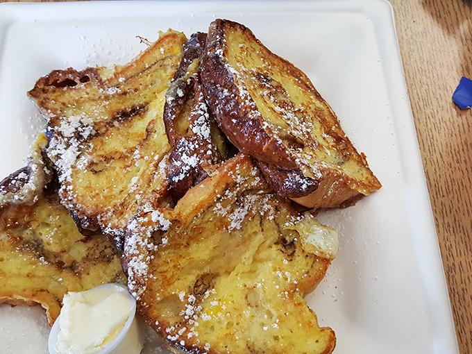 French toast that makes you question why you ever settled for cereal. Comfort food elevated to an art form.