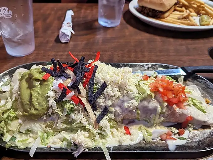 This isn't just a burrito—it's architecture. The structural integrity alone deserves an engineering award, not to mention the flavor payload inside.