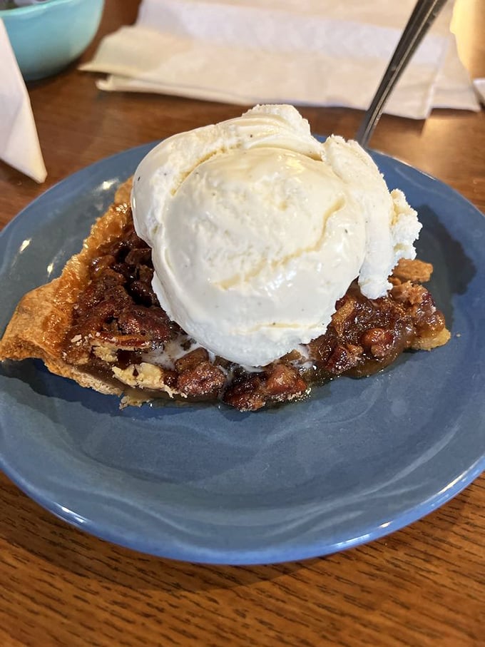 The bourbon pecan pie with ice cream doesn't just satisfy hunger—it solves problems you didn't know you had. Worth every mile of the drive.