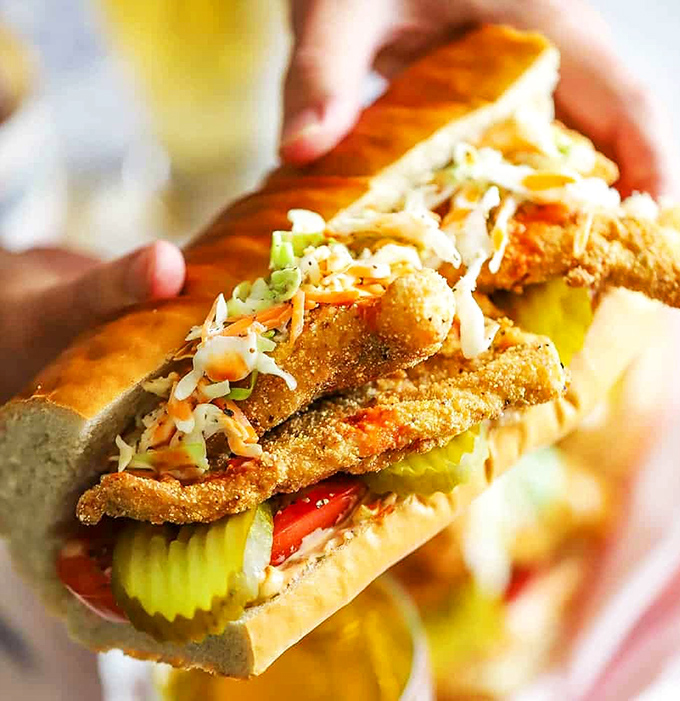 The catfish sandwich that launched a thousand return visits—perfectly crispy, generously portioned, and topped with just the right amount of crunchy slaw.
