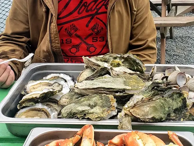 A seafood feast fit for Neptune himself—freshly shucked oysters and local catch arranged with the casual elegance of coastal dining.