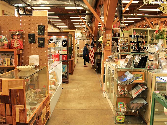 Narrow aisles create forced intimacy with strangers who share your fascination for obsolete gadgets and bygone aesthetics. The treasure hunt brings everyone together.