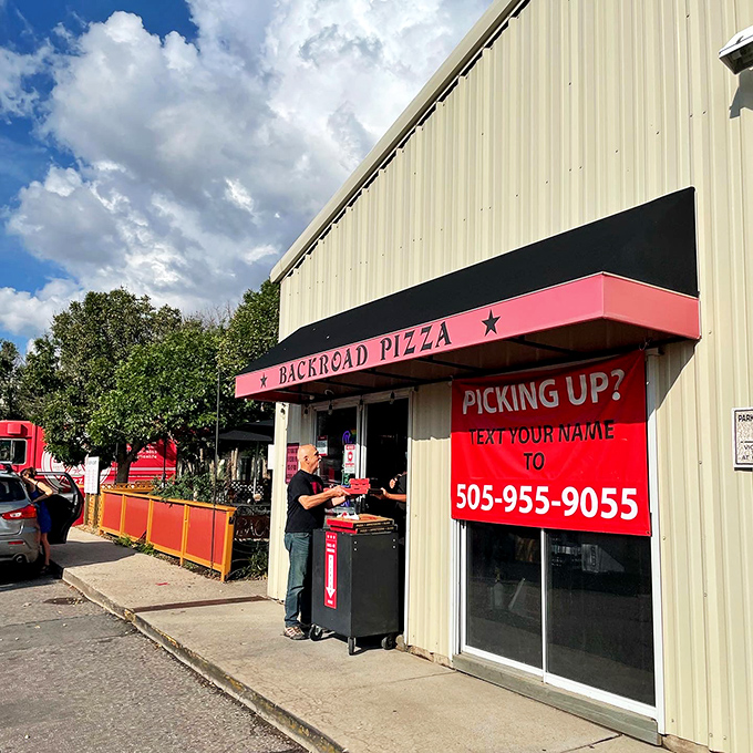 Back Road Pizza's industrial exterior hides treasure within – like finding an unassuming paperback that turns out to be literature's greatest hit.