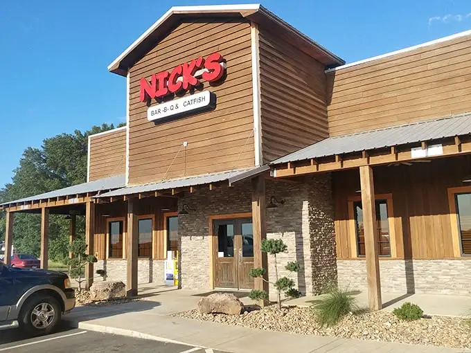Nick's rustic wooden facade isn't just charming—it's a smoke-seasoned preview of the flavor-packed treasures inside.