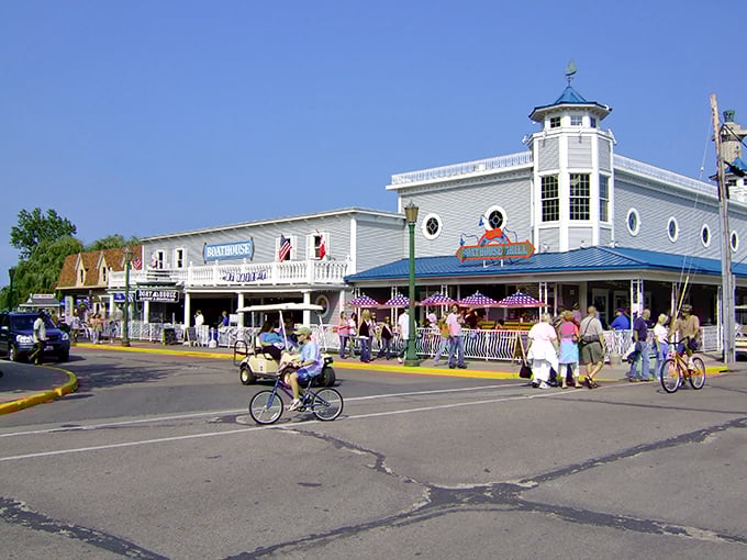 The boardwalk buildings of Put-in-Bay stand like a cheerful maritime welcome committee, practically begging you to order something with umbrella in it.