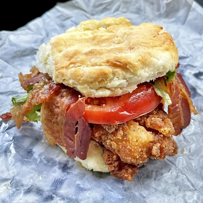 The sandwich equivalent of hitting the lottery. Fried chicken, bacon, fresh tomato, and lettuce on a cloud-like biscuit.