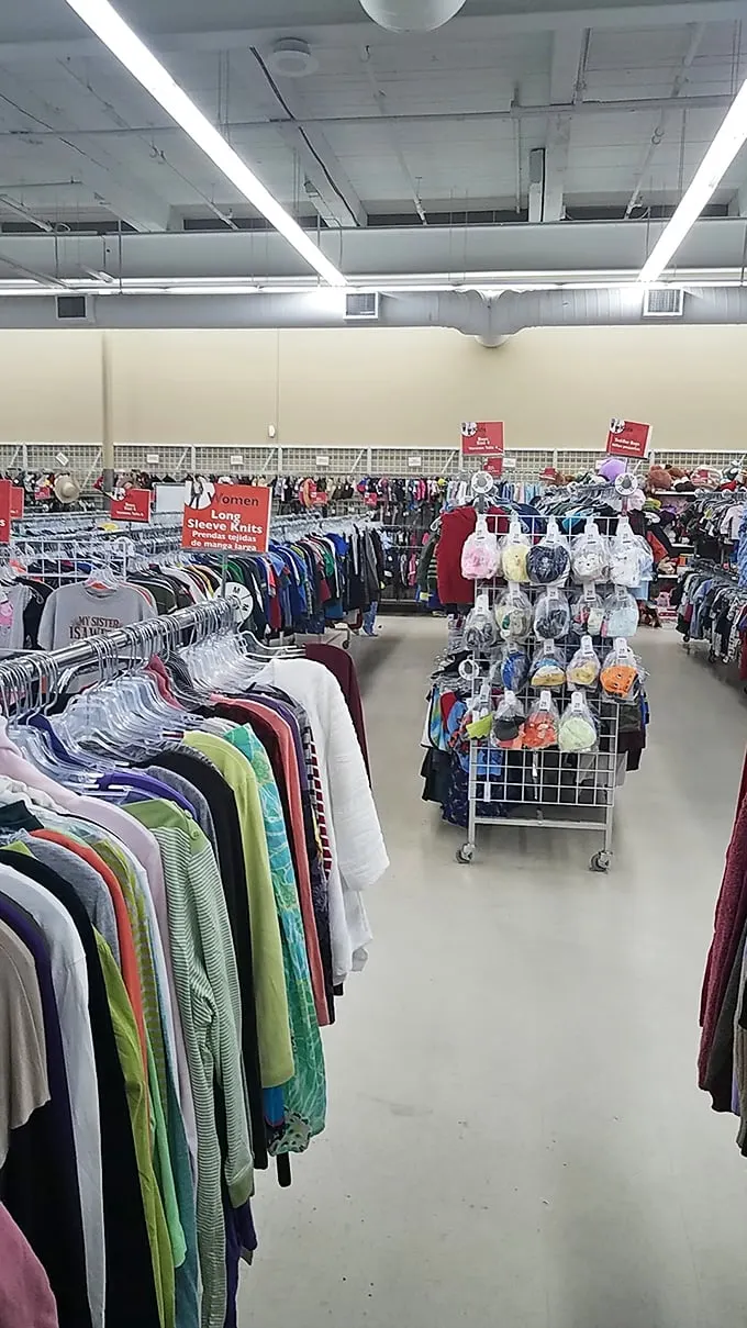 The women's section stretches to the horizon, a sea of possibilities where vintage treasures hide among everyday finds like diamonds in the rough.