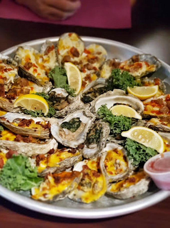 Oysters that look like they were plucked from the sea this morning, adorned simply with lemon and parsley—nature's perfect appetizer.