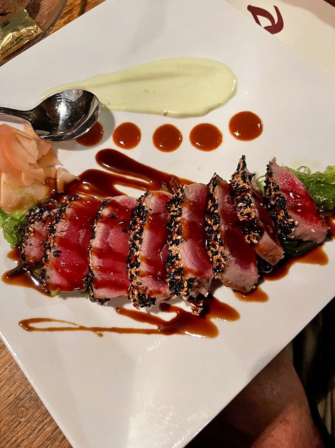Sesame-crusted ahi tuna, seared rare and sliced like jewels. The kind of dish that makes you wonder why you ever settled for canned tuna sandwiches.