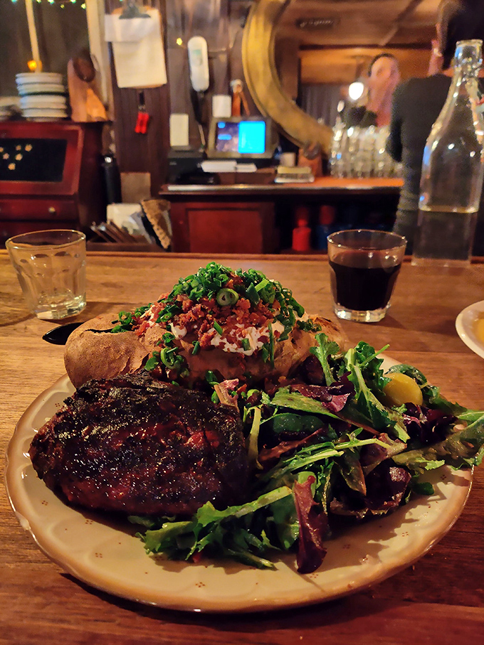 If this bone-in filet could talk, it would say "I've been waiting for you." The loaded baked potato isn't jealous—it knows it's equally magnificent.